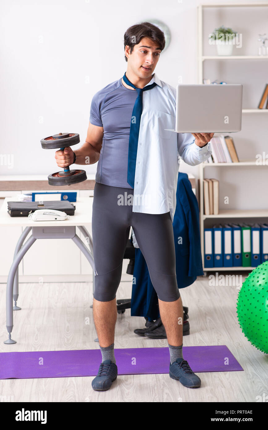 Employee combining work and healthy lifestyle Stock Photo - Alamy