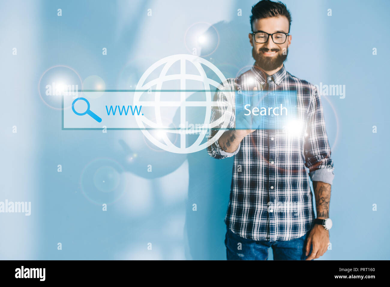 smiling developer pointing at website search bar Stock Photo - Alamy