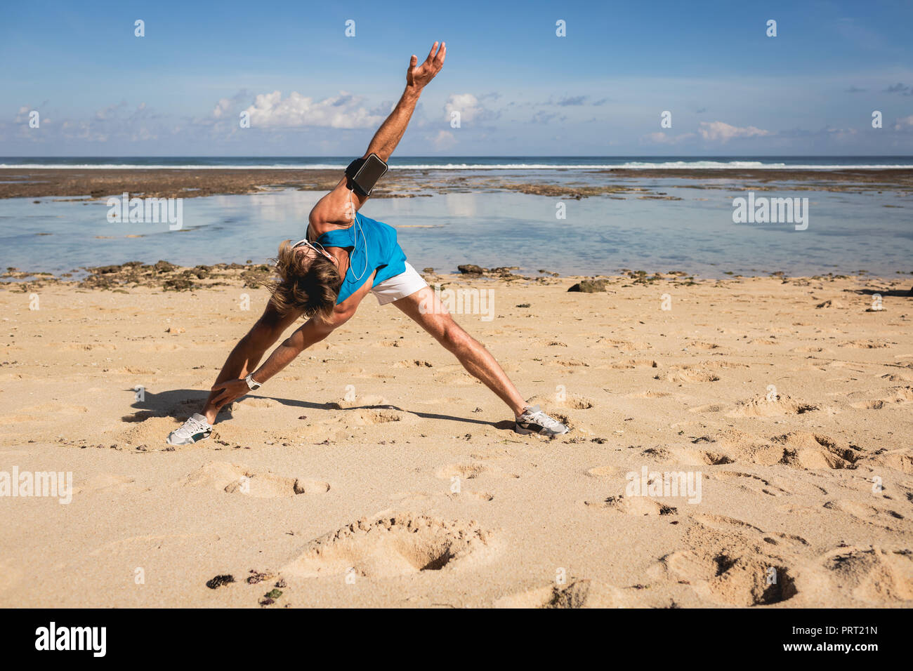 athletic man doing workout on beach, Bali, Indonesia Stock Photo - Alamy