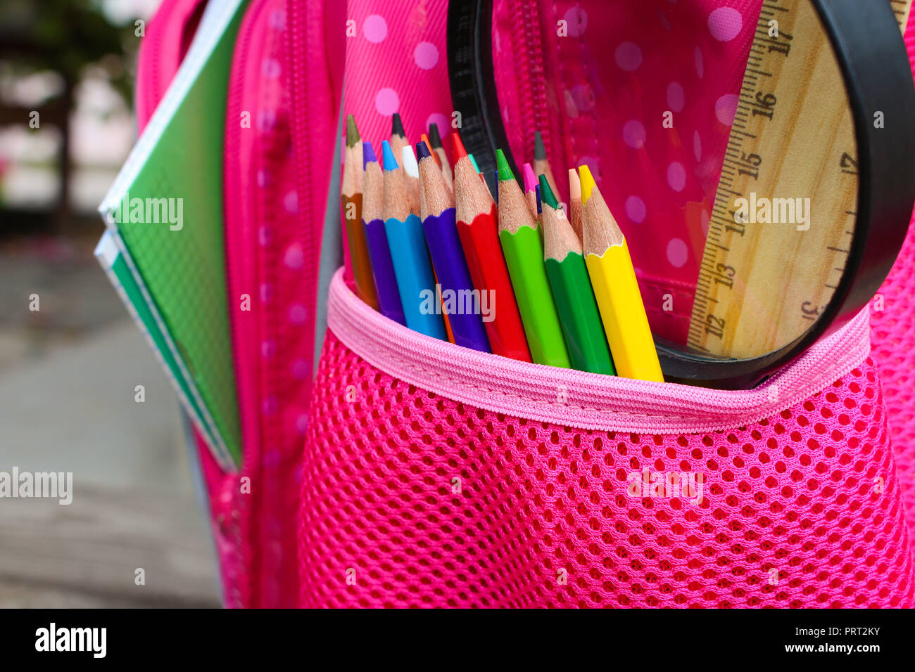 Stationery objects. School supplies are in school backpack. Toned image ...