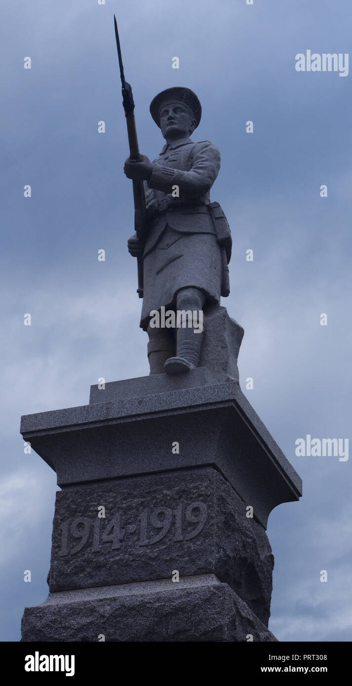 Close up view of a First World War memorial infantryman holding his ...