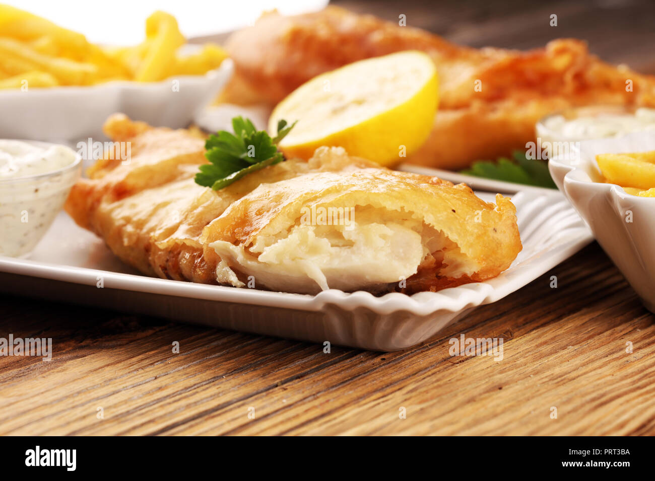 traditional British fish and chips consisting of fried fish, potato ...