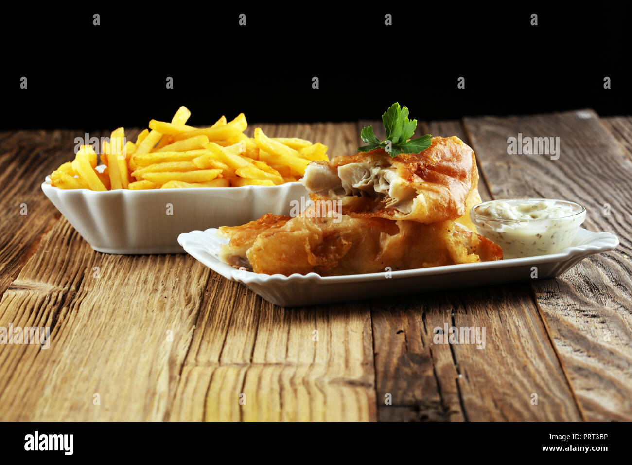 traditional British fish and chips consisting of fried fish, potato ...