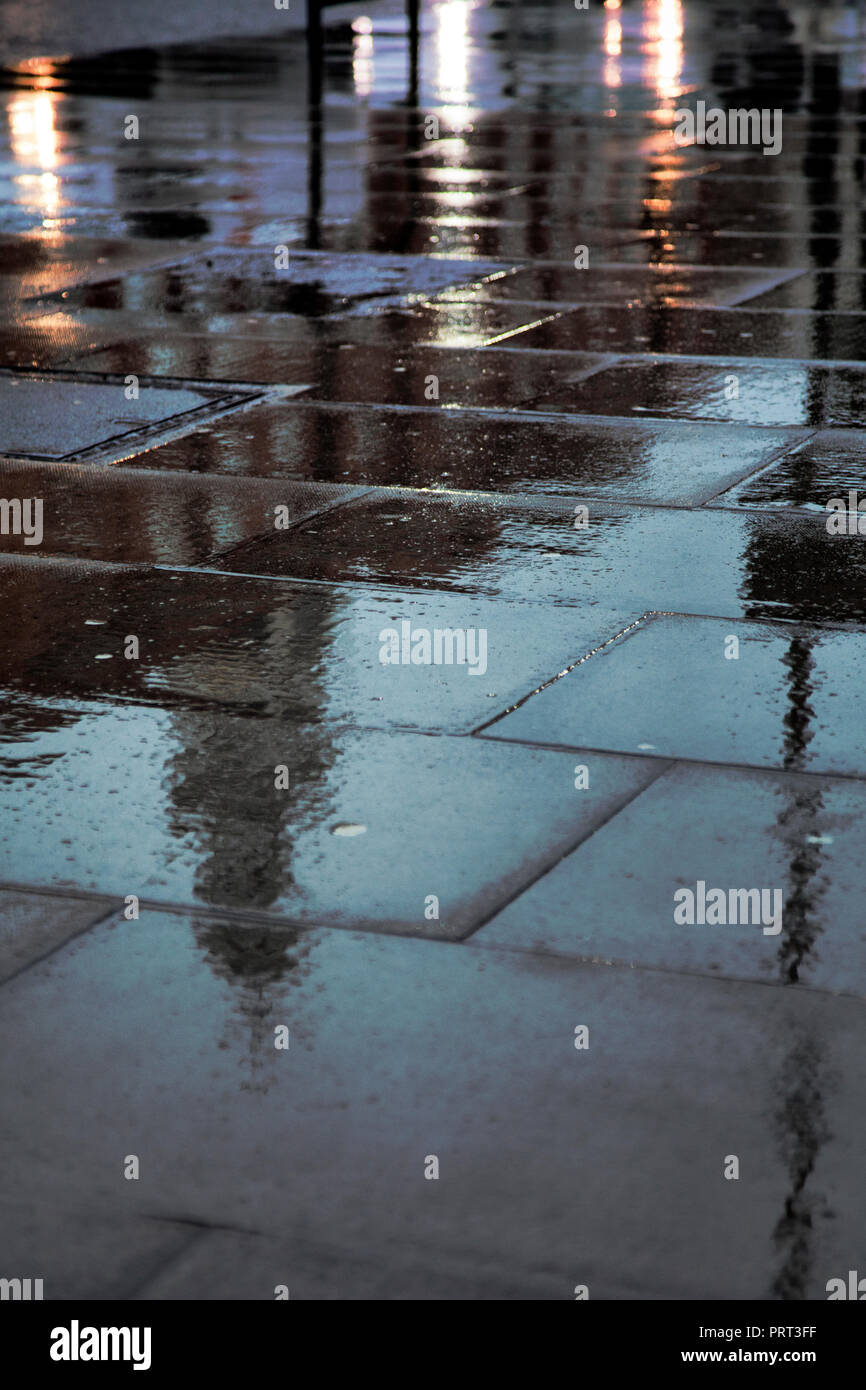 Wet sidewalk reflection hi-res stock photography and images - Alamy