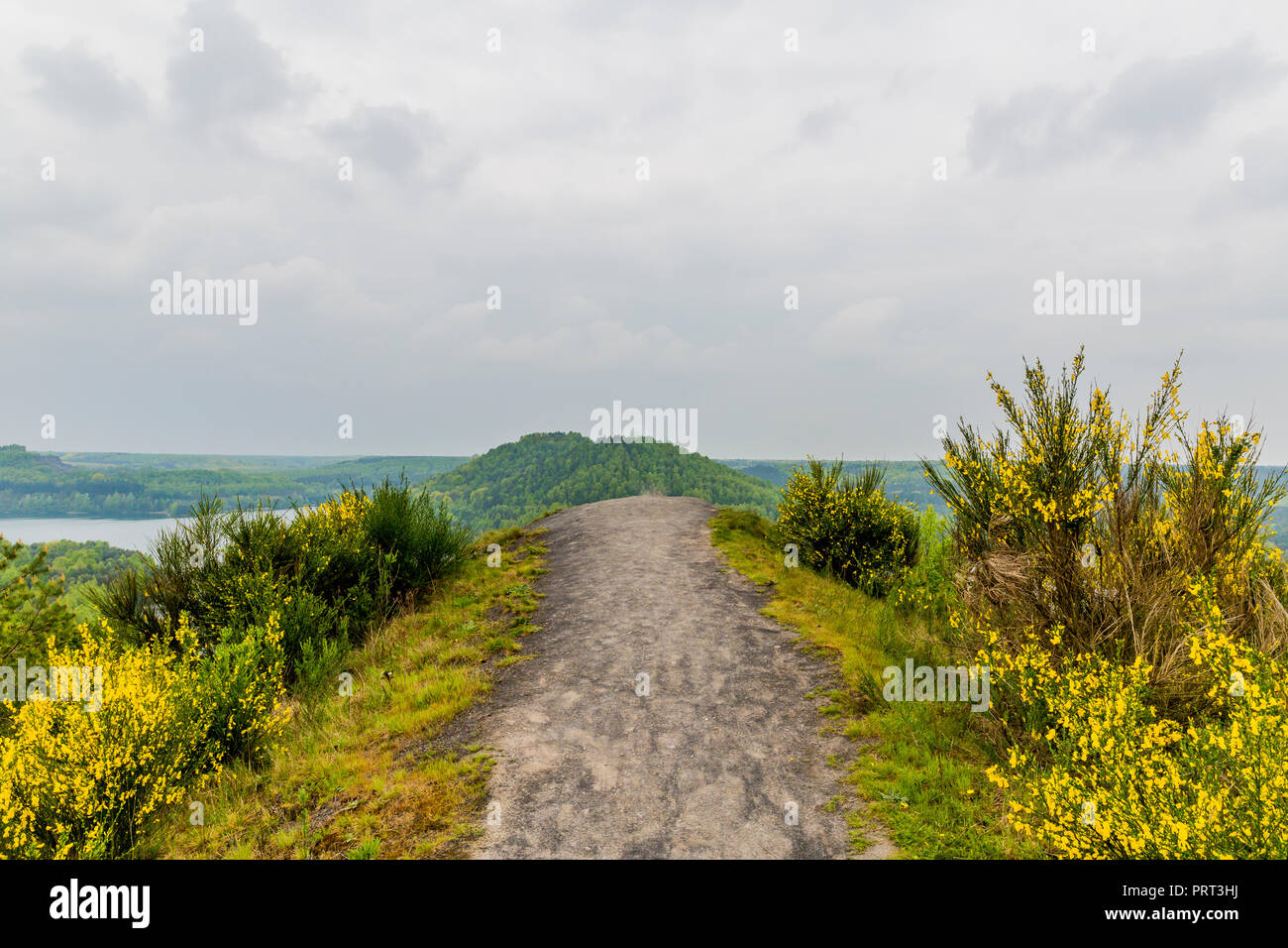 impressive image of a footpath on the top of a mountain and observing a ...