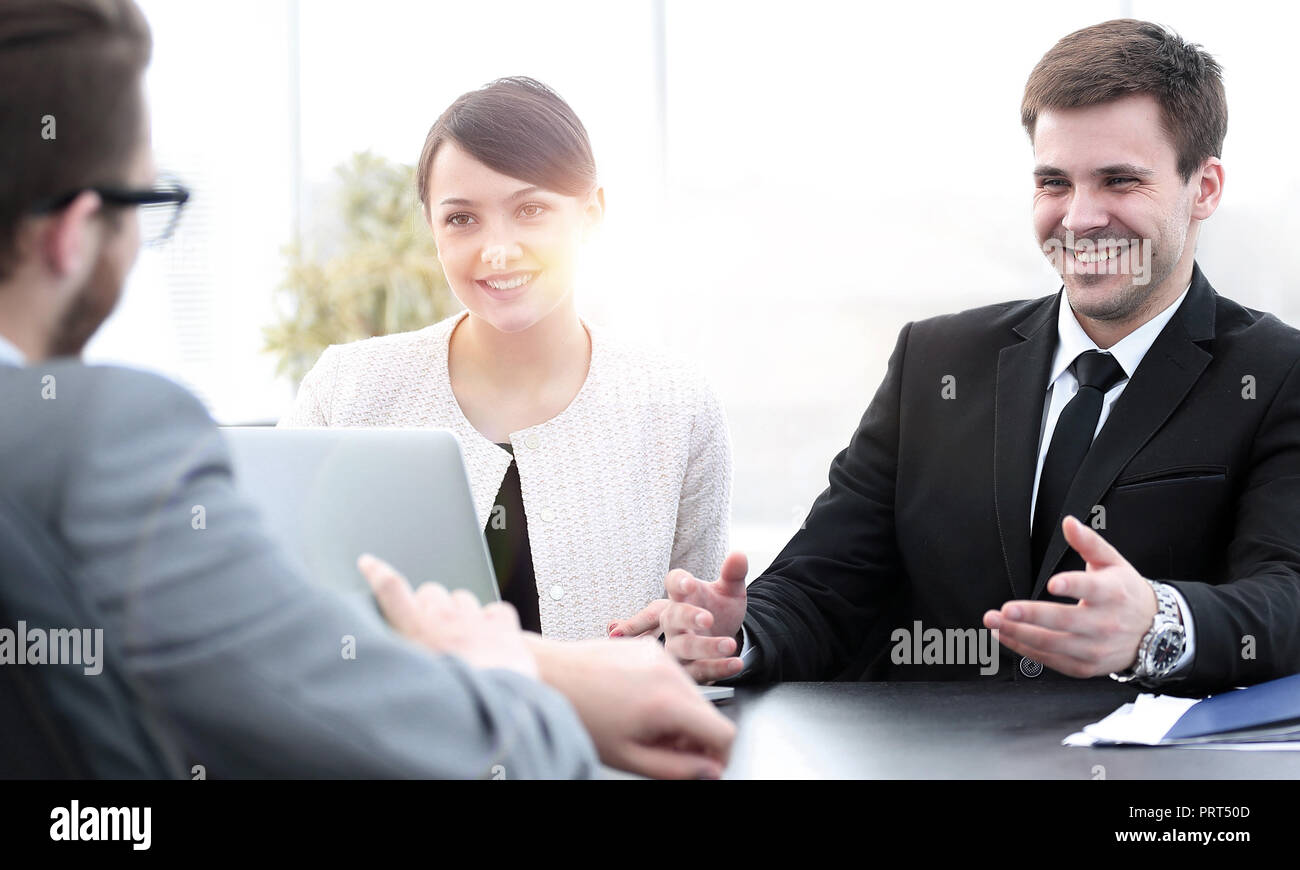 employees communicate with the customer in the office Stock Photo - Alamy