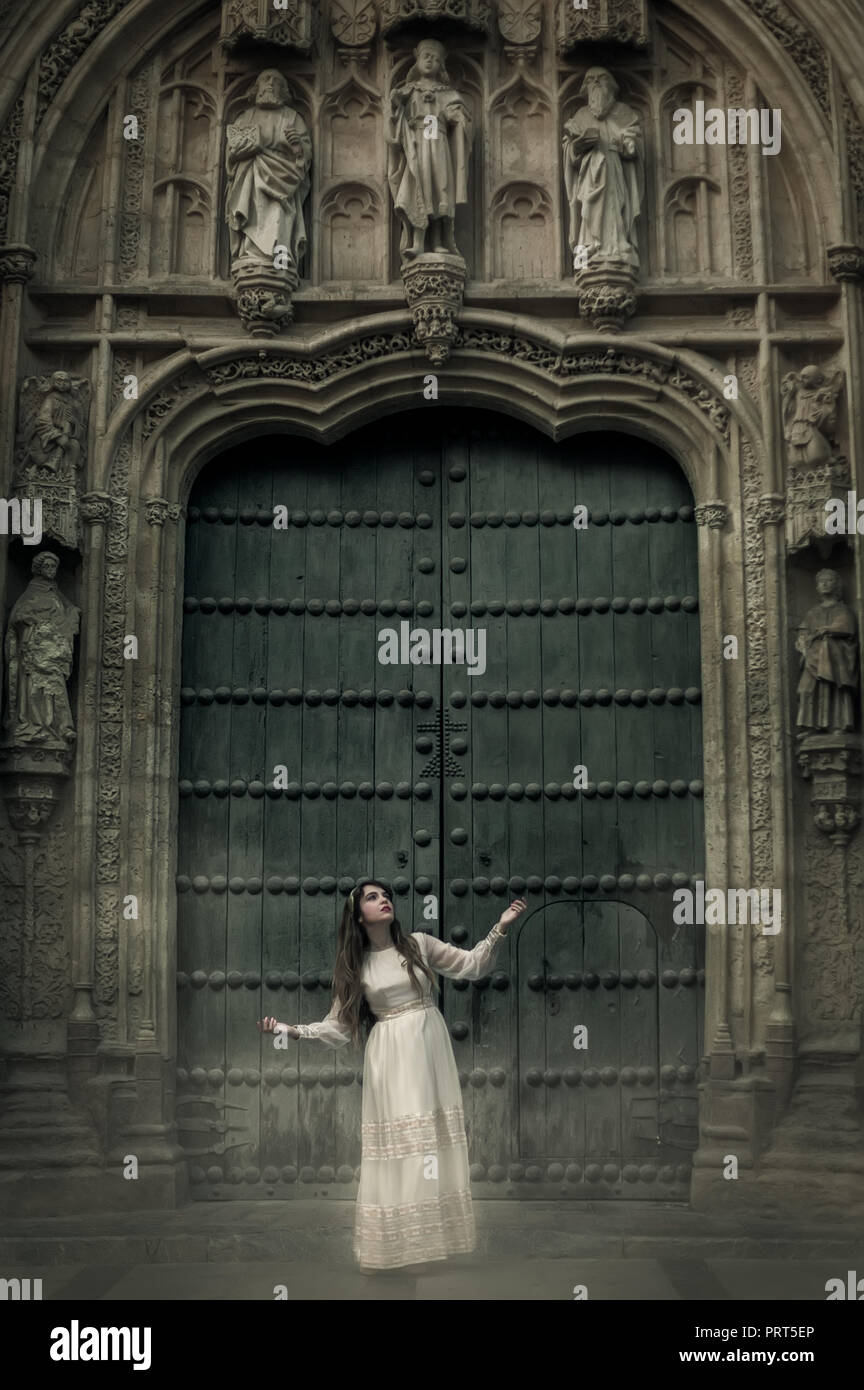 Woman building entrance in front hi-res stock photography and images ...