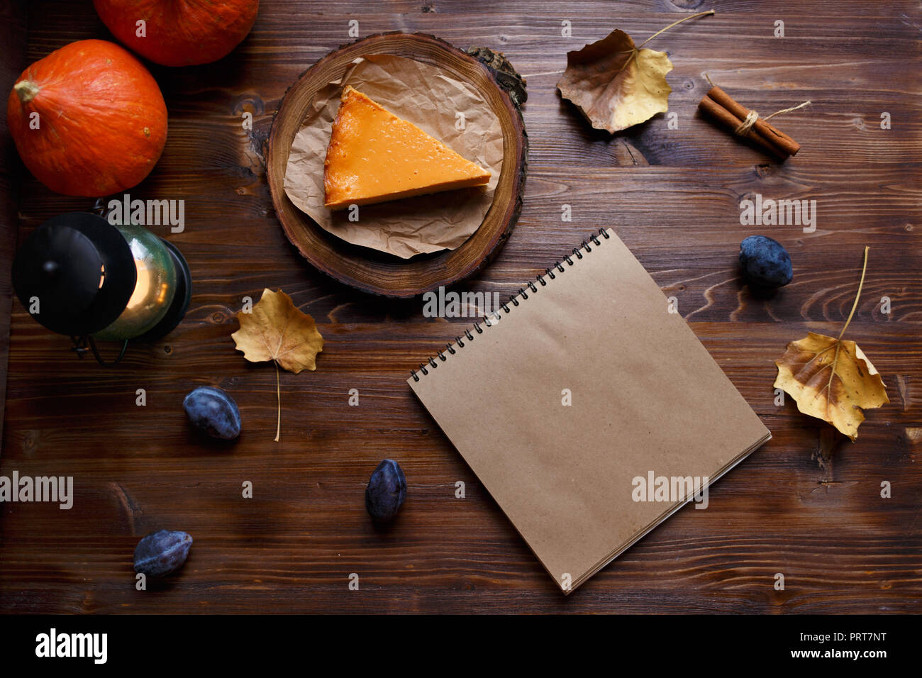 Notebook, pumpkin cheesecake, cooked at home, pumpkin, foliage, table ...