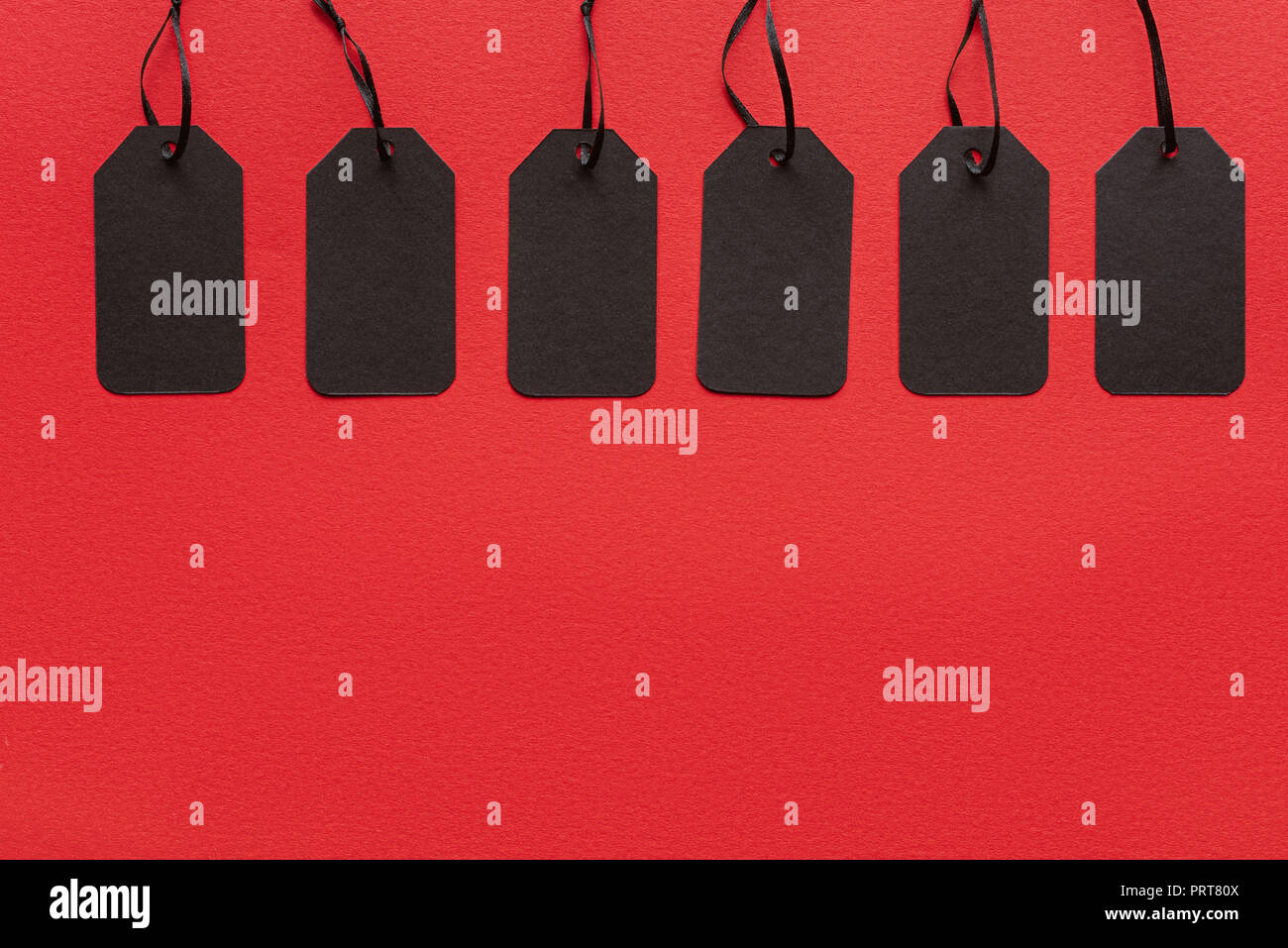 black sale tags isolated on red for special offer on black friday Stock ...
