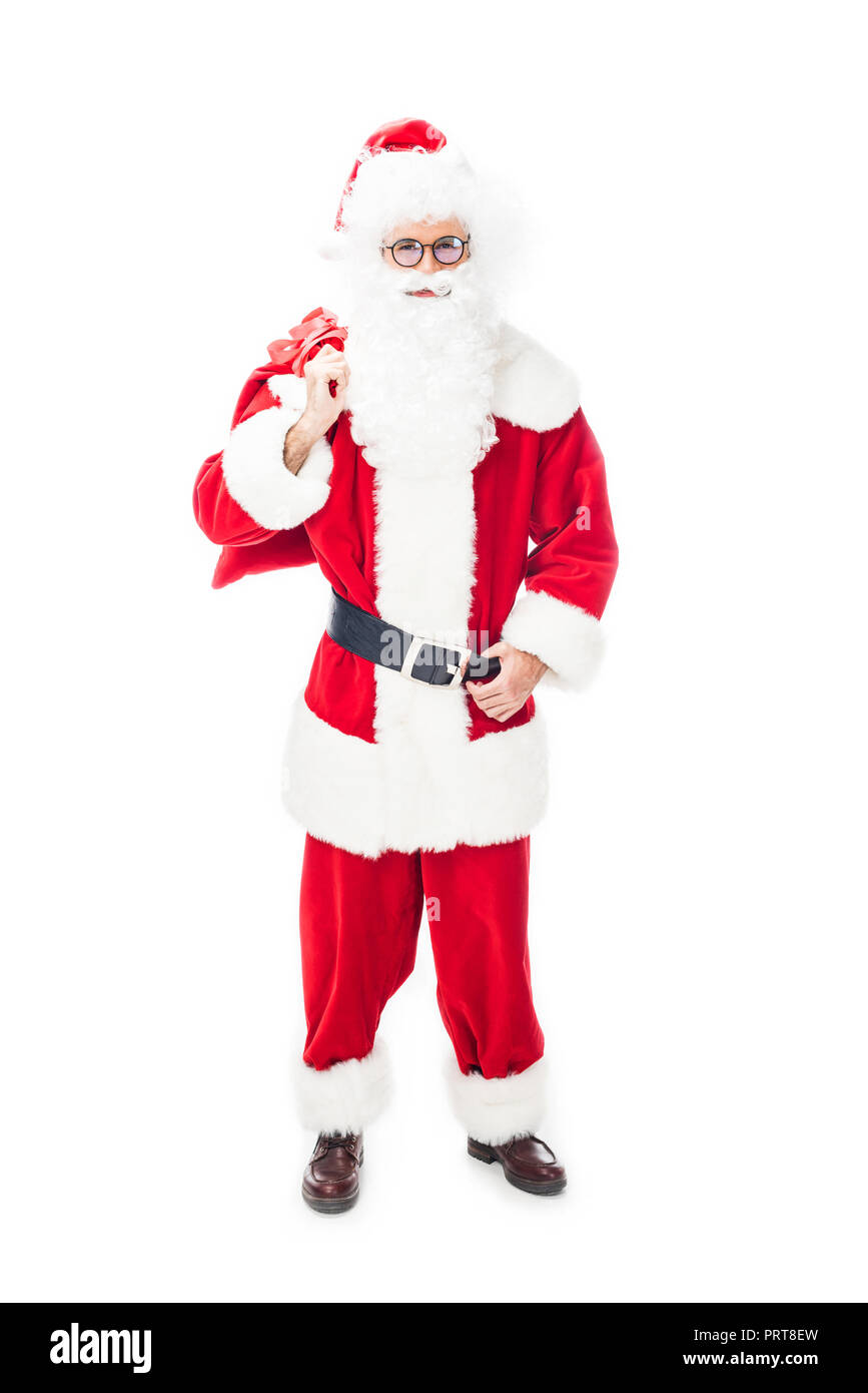 smiling santa claus in eyeglasses holding christmas sack over shoulder ...