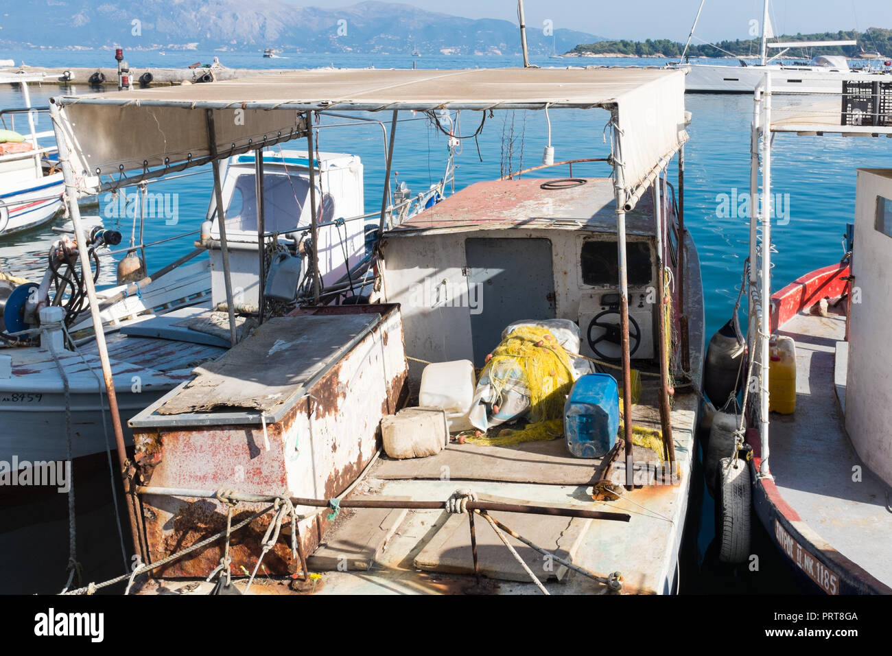 Fishing boats moored in the harbour at Corfu Town in the Greek Island ...
