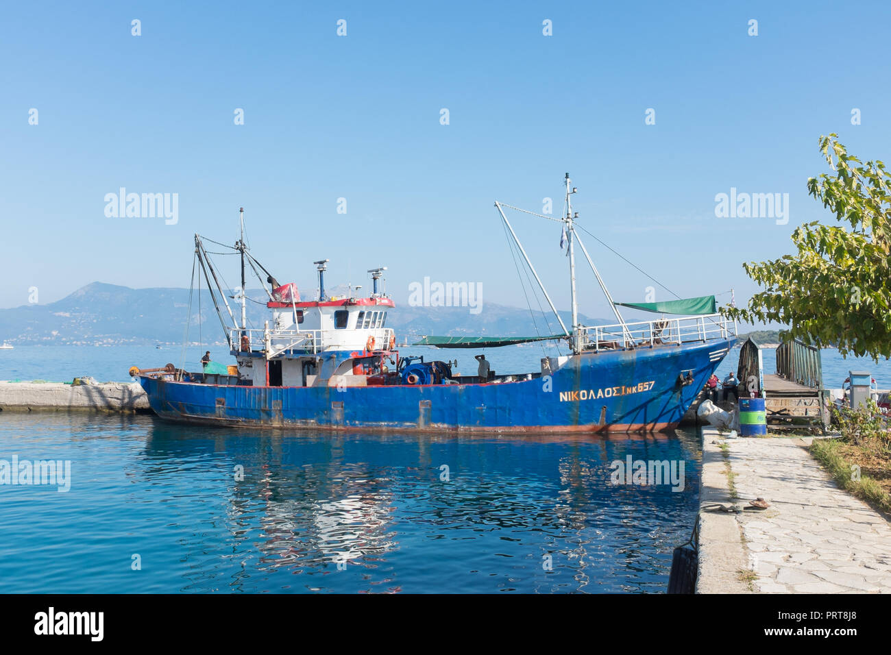 Fishing boats moored in the harbour at Corfu Town in the Greek Island ...