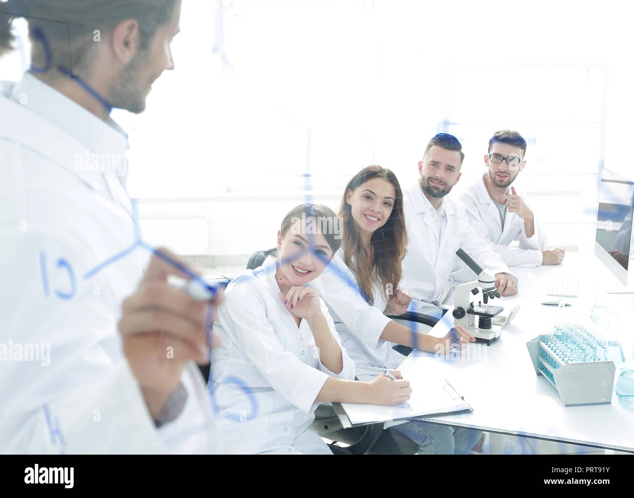 view through the transparent Board. a scientist makes a report Stock ...