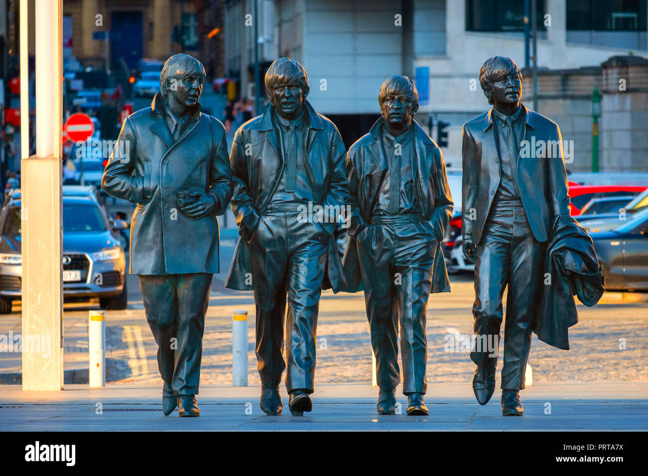 Liverpool, UK - May 17 2018: Bronze statue of the Beatles stands at the ...