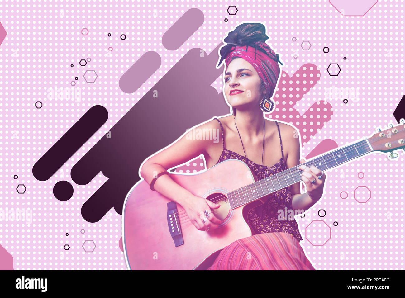 Pretty young musician playing wonderful music on the guitar Stock Photo ...