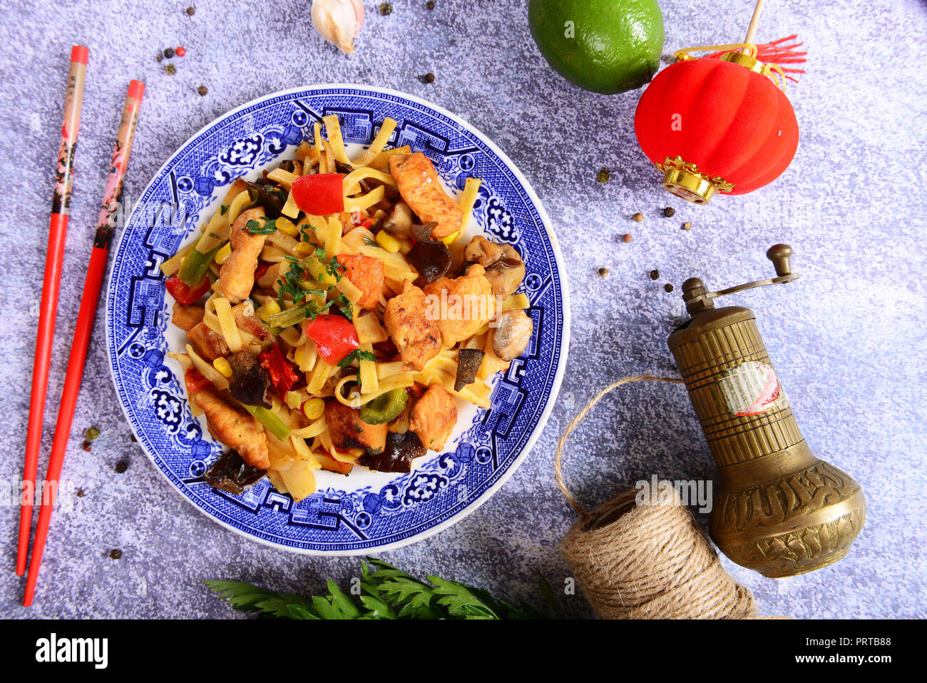 Asian food - noodles with vegetables and chicken Stock Photo - Alamy