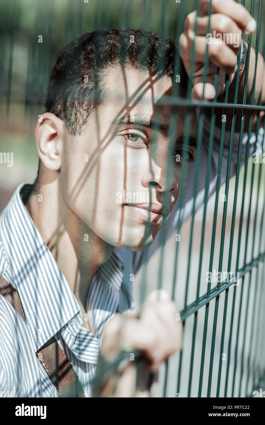 Pleasant sad guy missing his ex girlfriend Stock Photo - Alamy