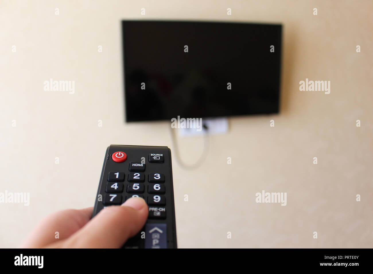 Female hand turns volume hi-res stock photography and images - Alamy