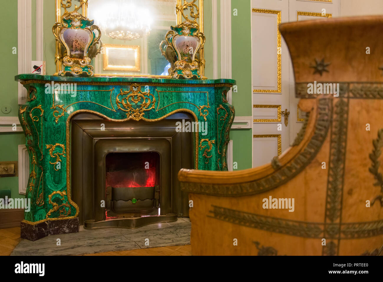 SAINT PETERSBURG, RUSSIA - AUGUST 22, 2017: Malachite fireplace in the ...
