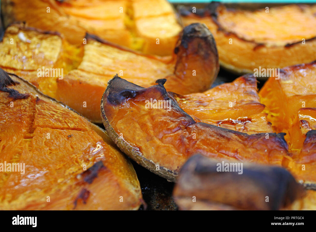 Organic Pumpkin slice baked for Halloween holiday. Colorful baked ...
