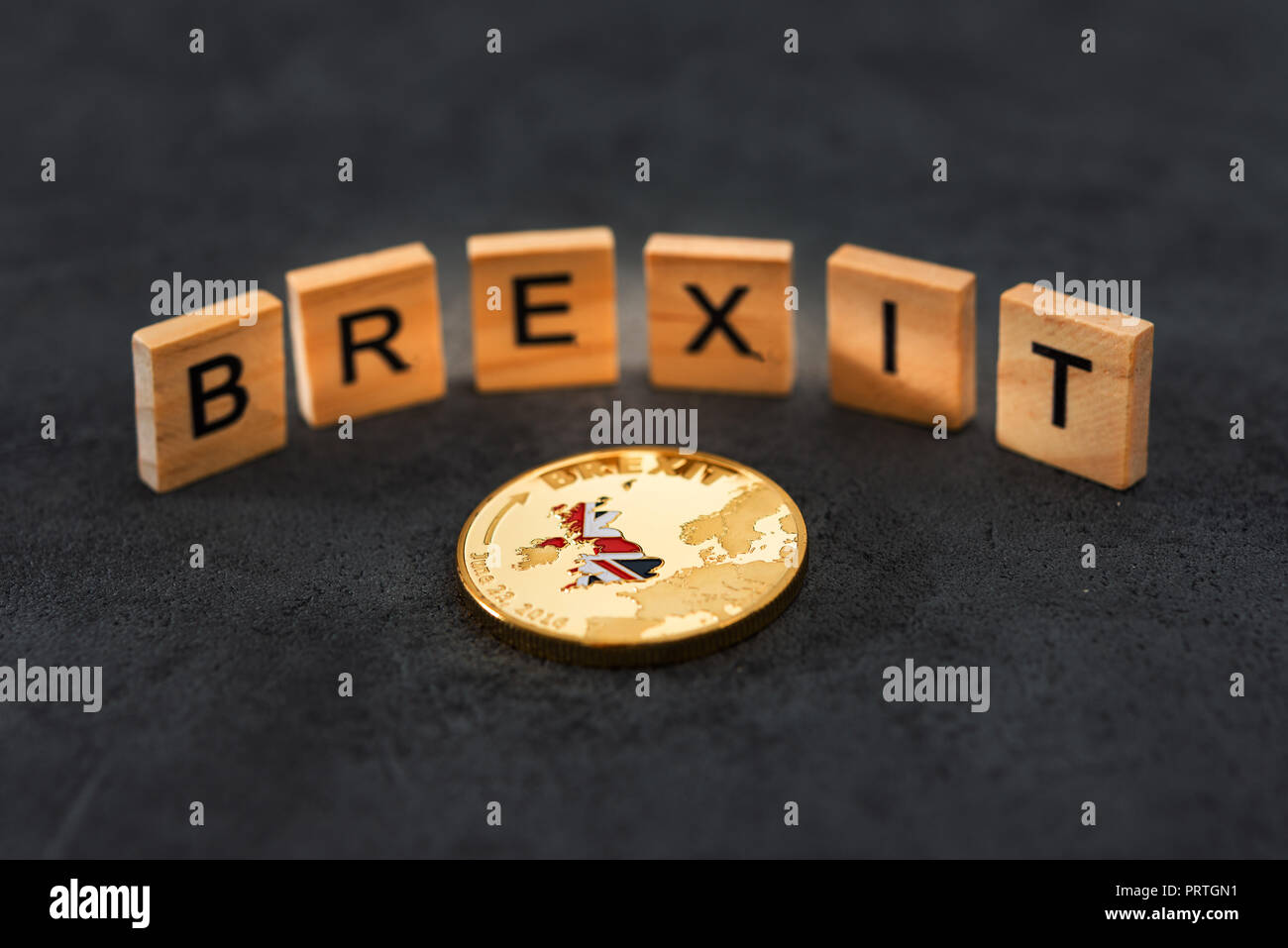 Brexit Concept - National Flag Gold Coin and English Words Stock Photo ...