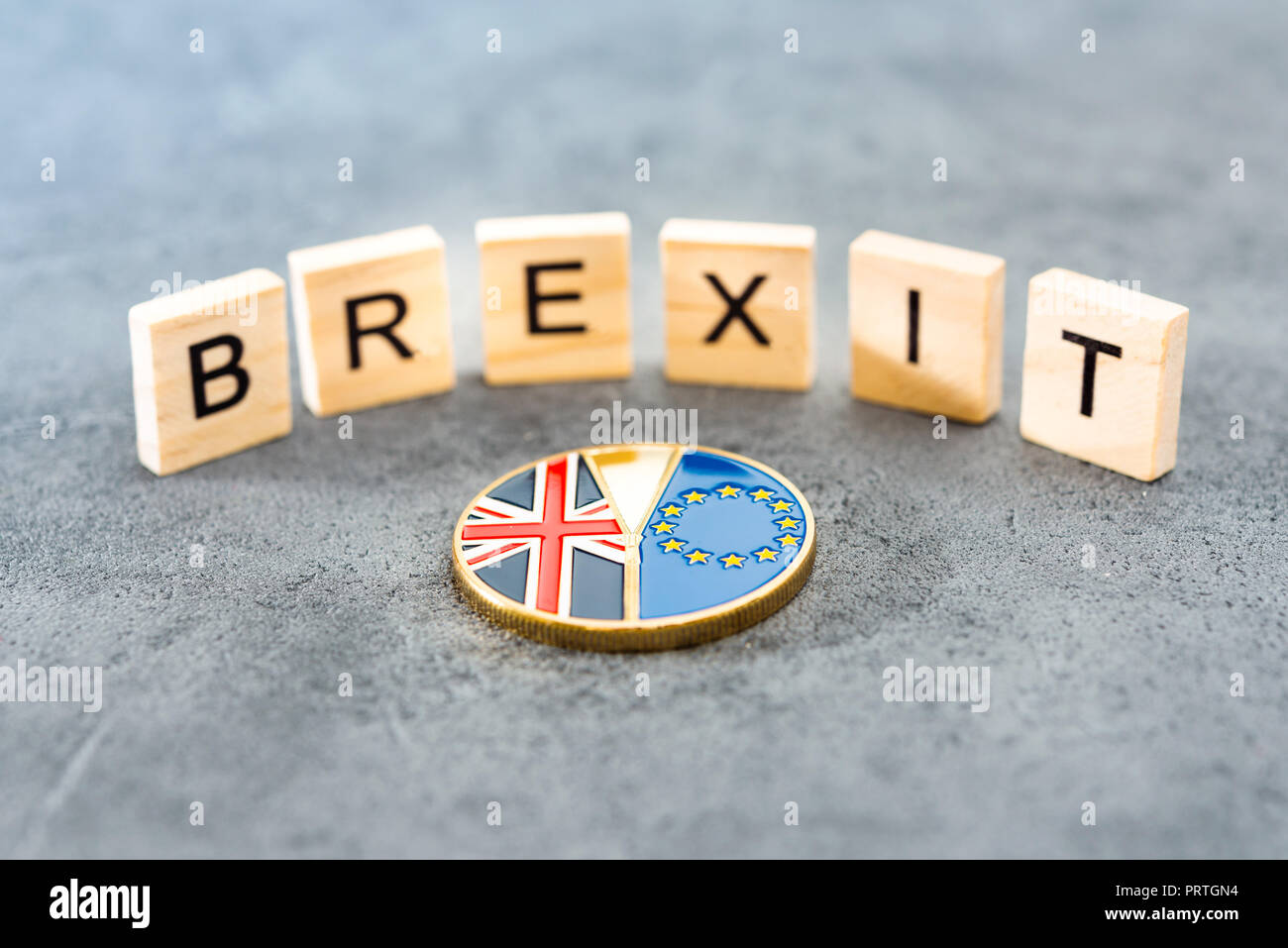 Brexit Concept - National Flag Gold Coin and English Words Stock Photo ...
