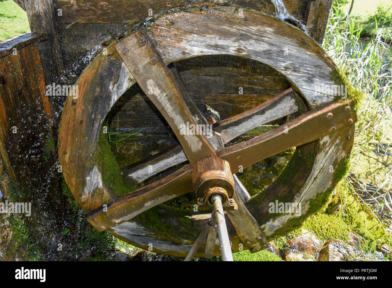 Antique wooden waterwheel at Engelberg on the Swiss alps Stock Photo ...