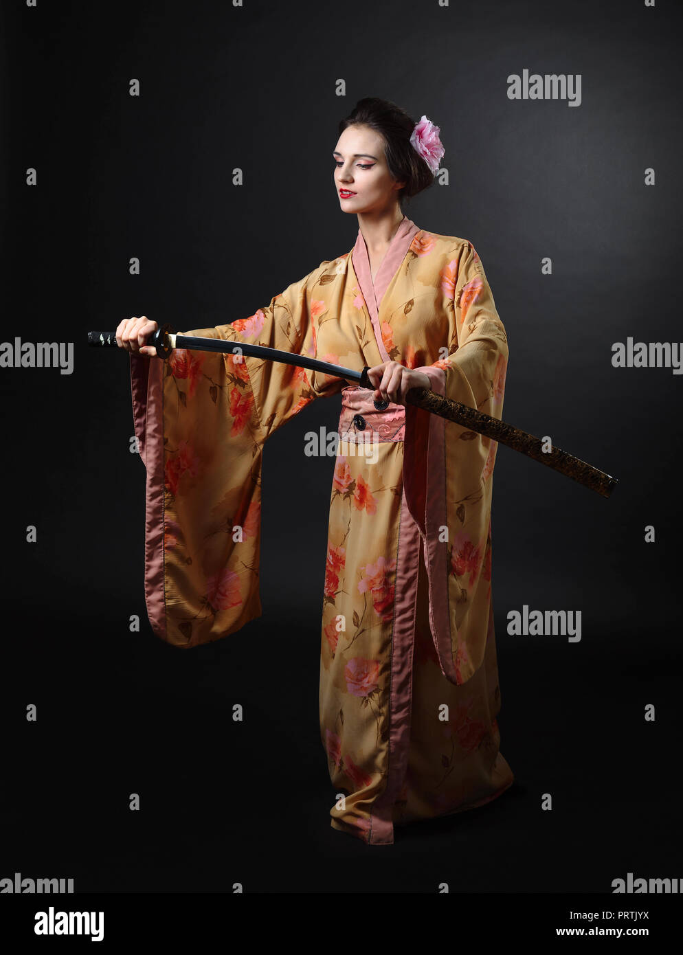 Woman kimono sword hi-res stock photography and images - Alamy