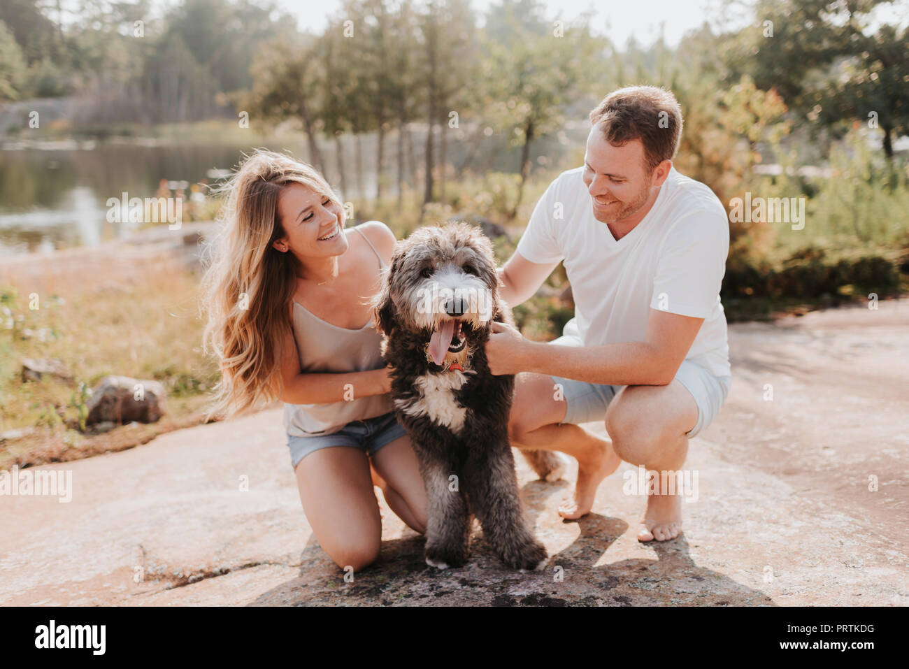 Couple and pet dog hi-res stock photography and images - Alamy