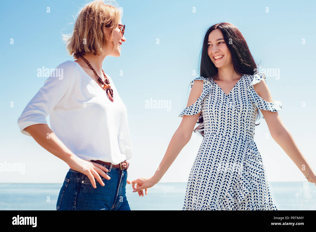 People talking seaside hi-res stock photography and images - Alamy