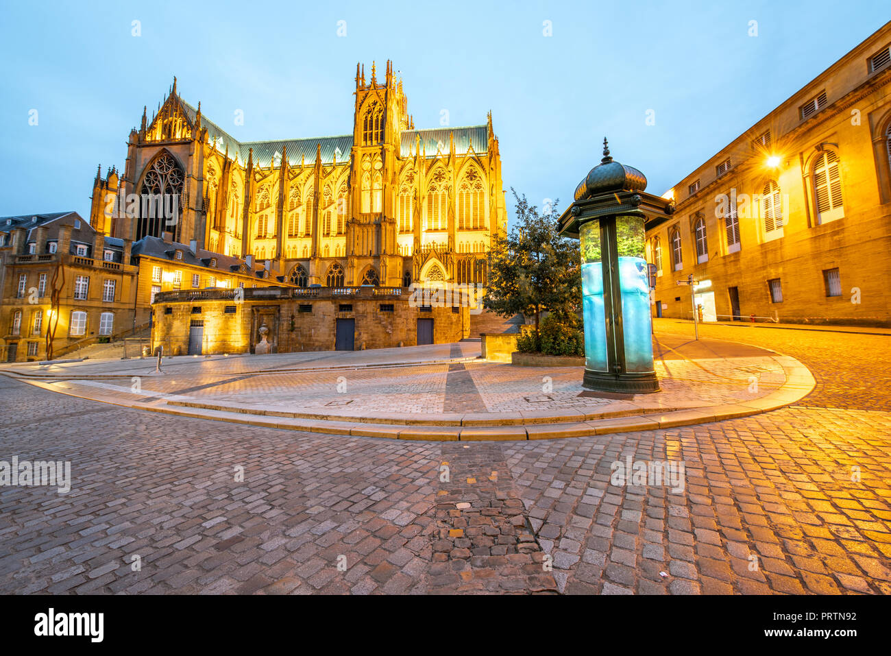 View on the beautiful illuminated cathedral in Metz during the twilight ...