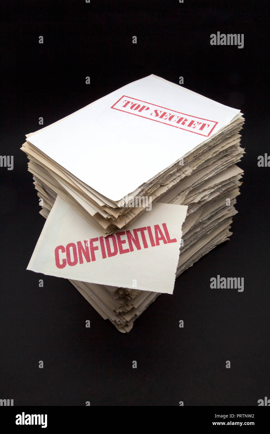 lot of confidential papers on black background Stock Photo - Alamy