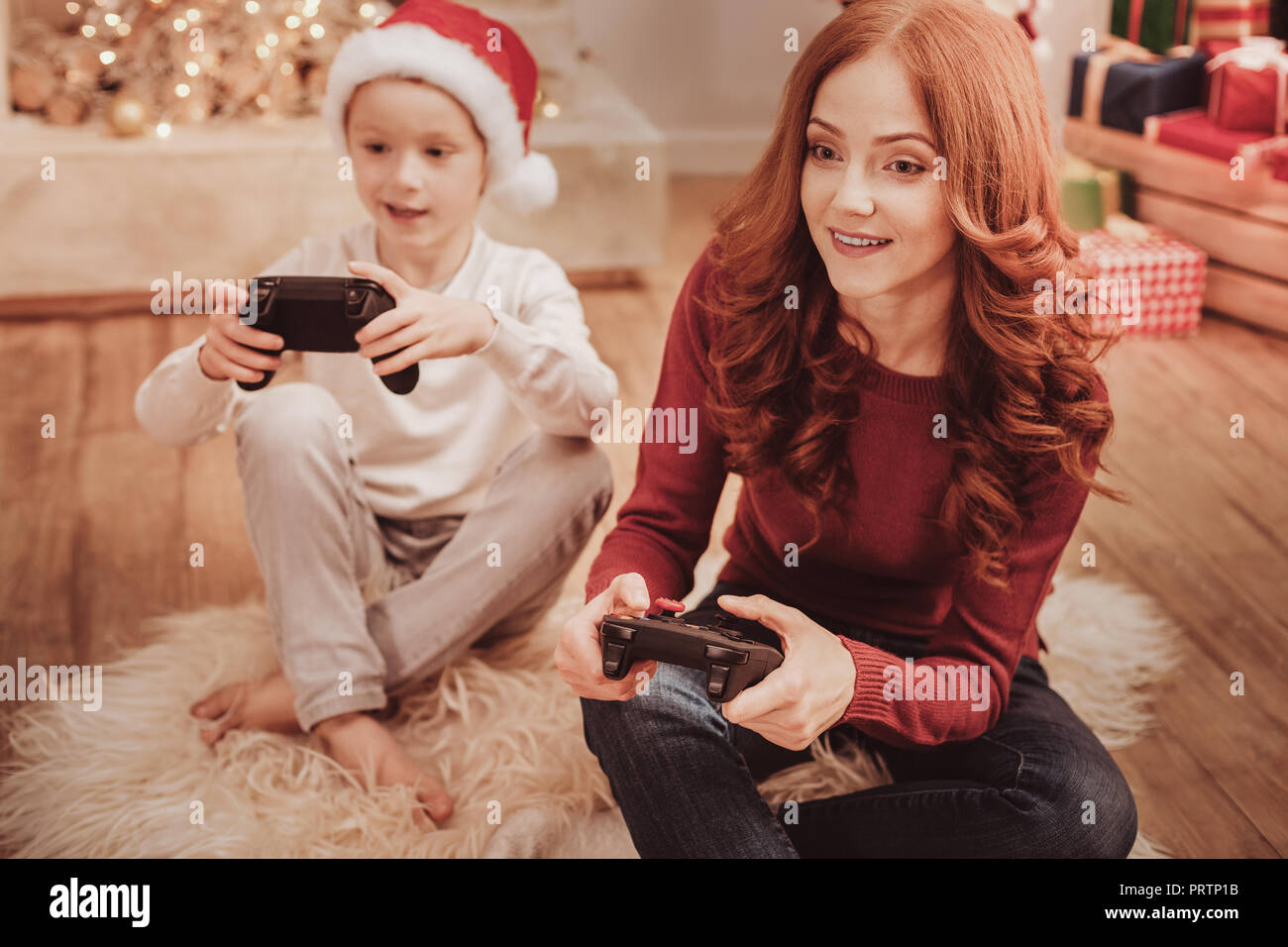 Mother son playing video games hi-res stock photography and images - Alamy