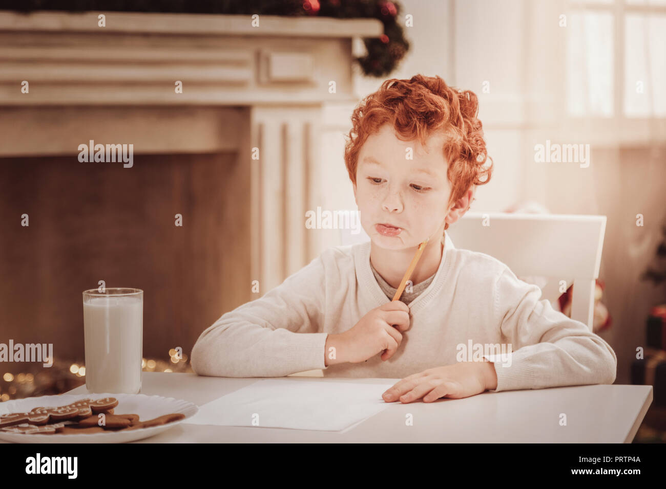 Portrait of pleasant boy thinking about idea for drawing Stock Photo ...