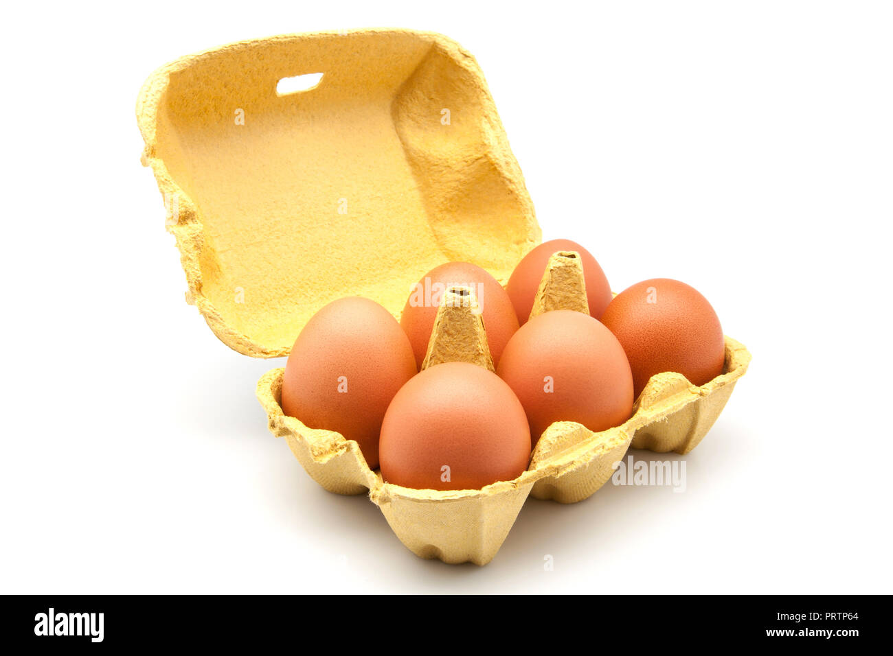 Six eggs in carton isolated on white Stock Photo - Alamy