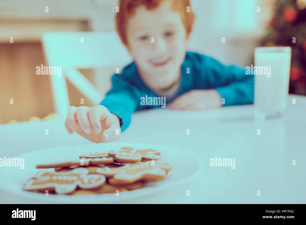 Focused photo on male hand that taking cookies Stock Photo - Alamy