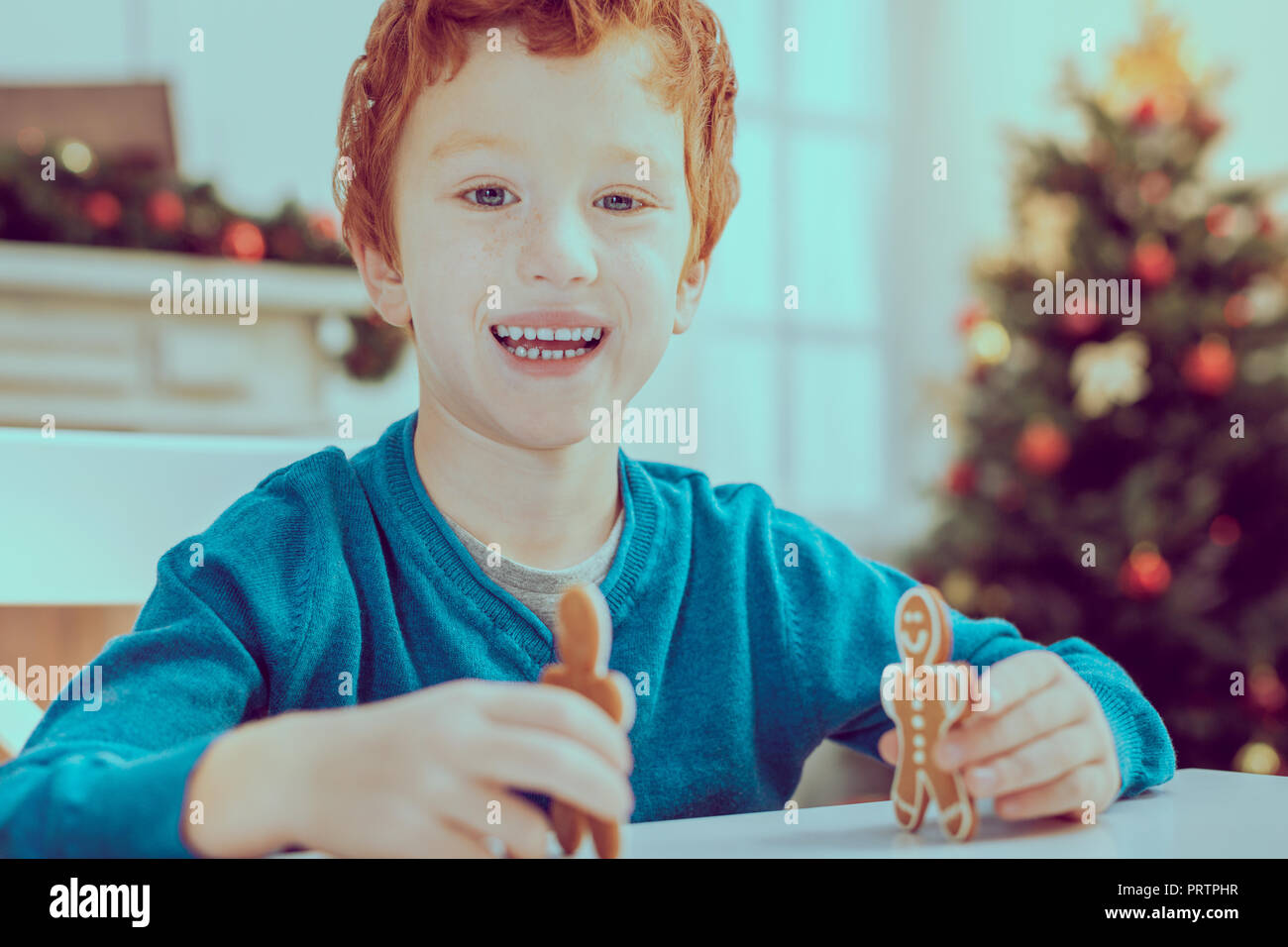 Delighted boy posing on camera Stock Photo - Alamy