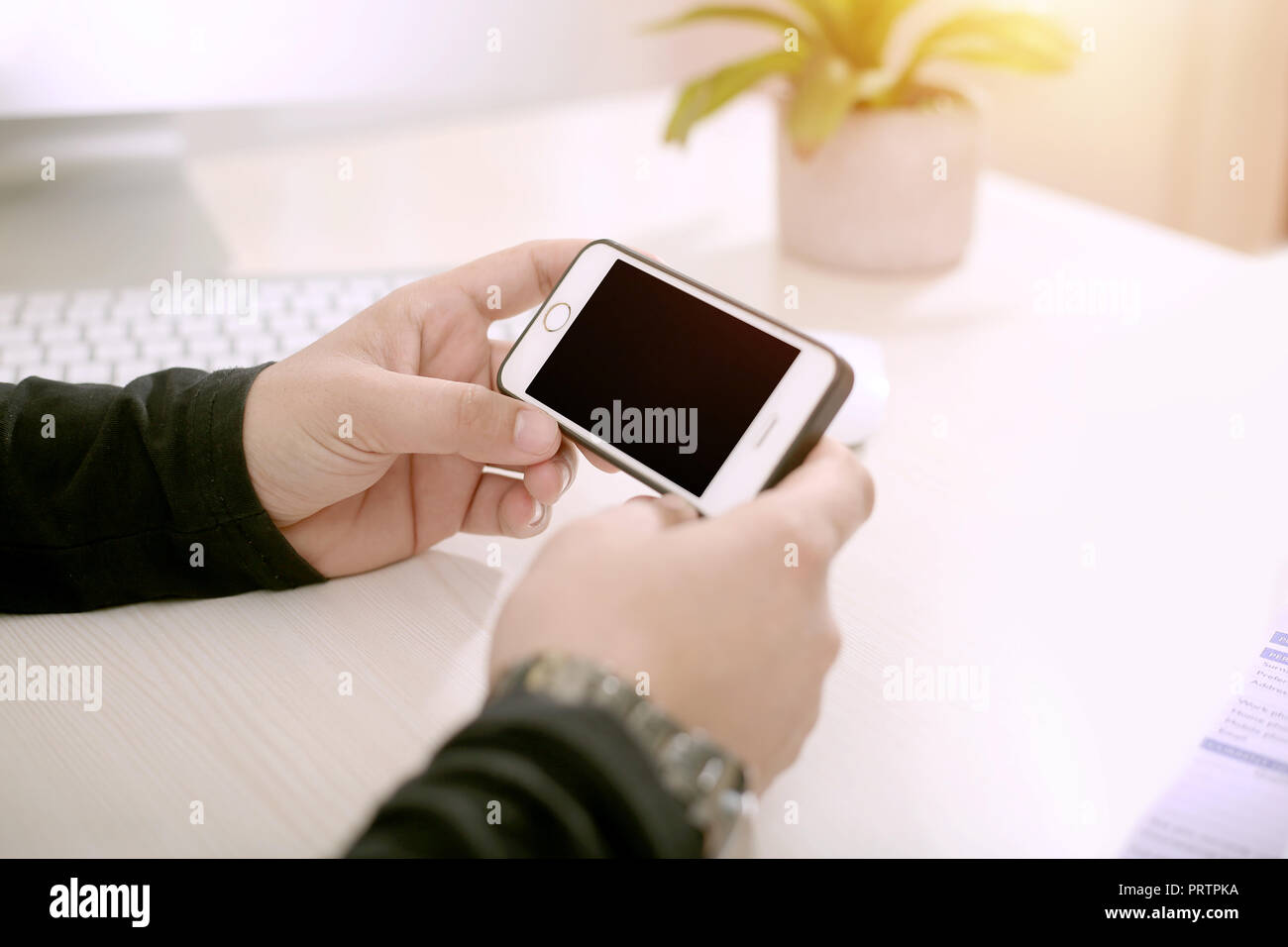 Picture of man holding smartphone Stock Photo - Alamy