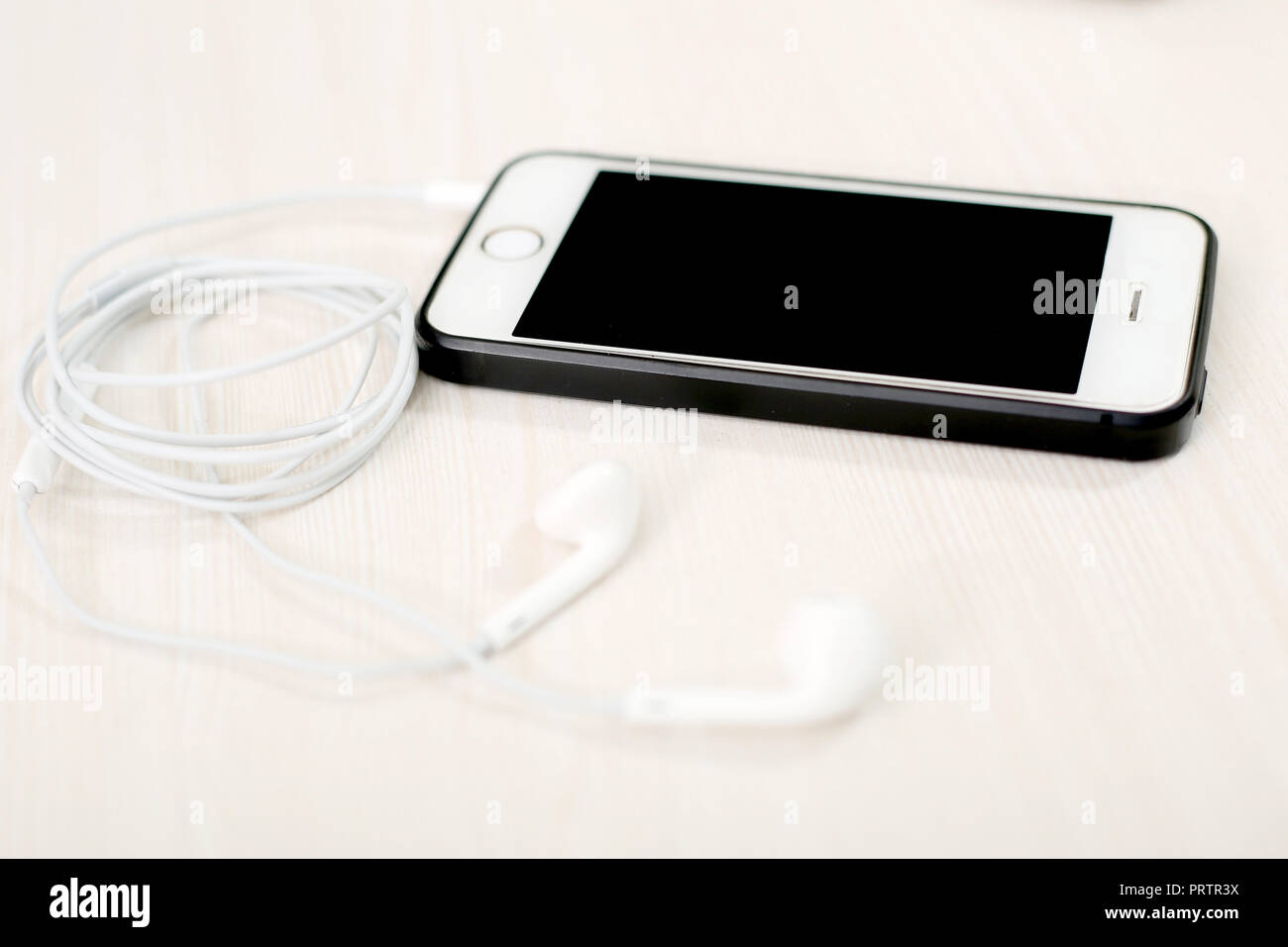 Picture of phone and earphone Stock Photo - Alamy