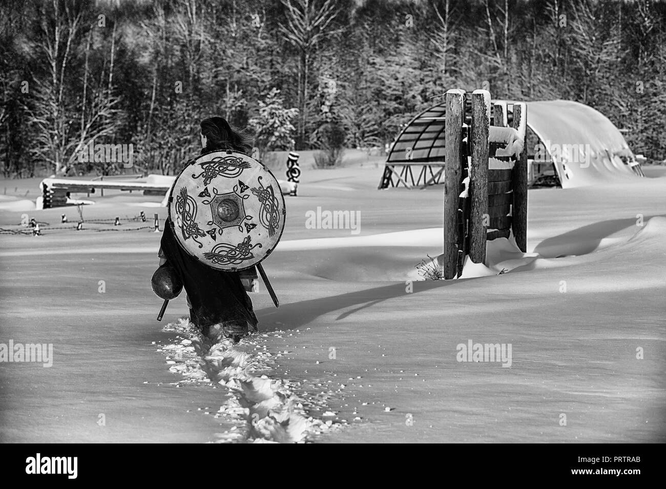 Defender the young warrior in armor Stock Photo - Alamy