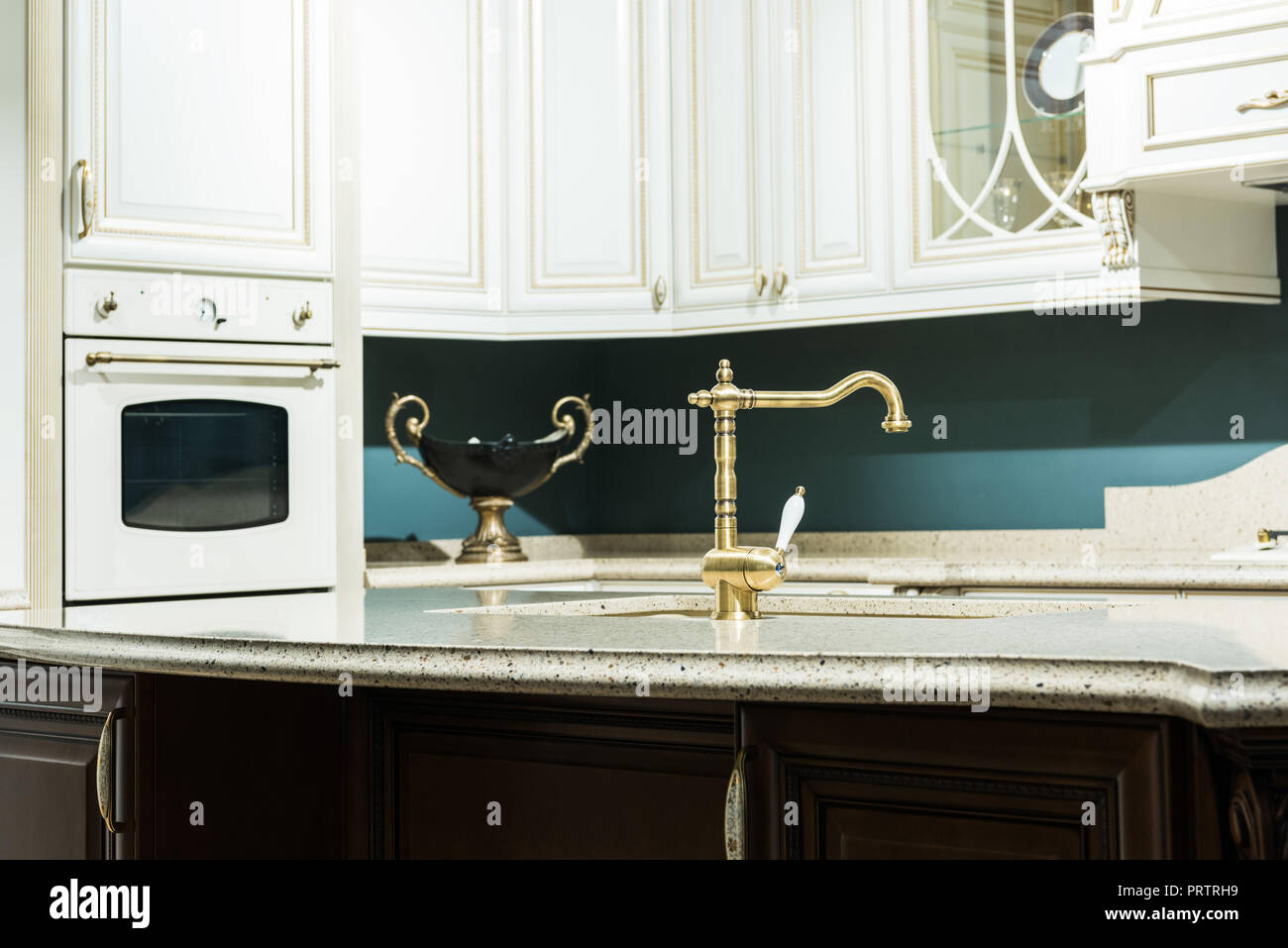 interior of modern kitchen in baroque style with tap and oven Stock ...