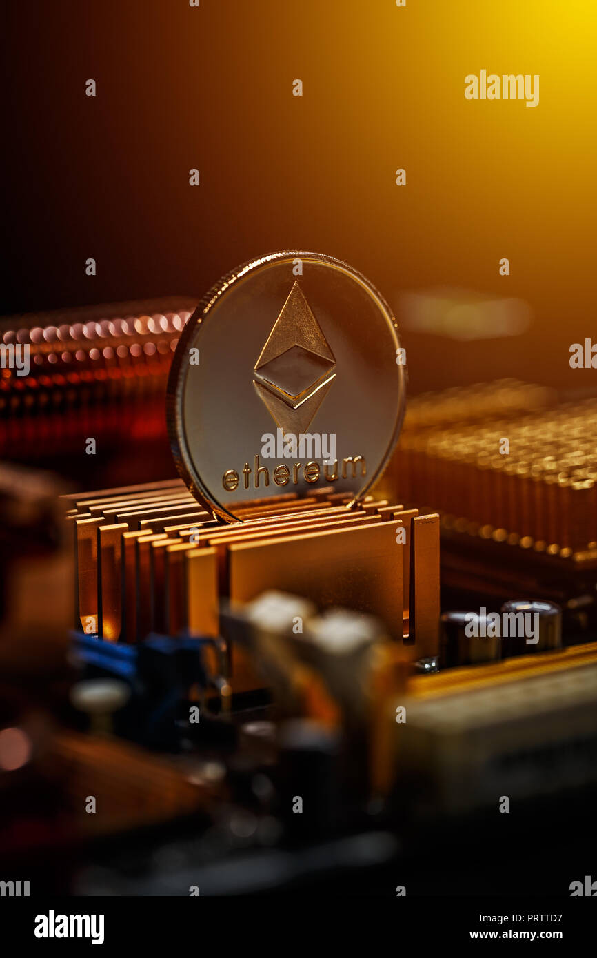 Ethereum coin on a computer motherboard. New independent worldwide ...