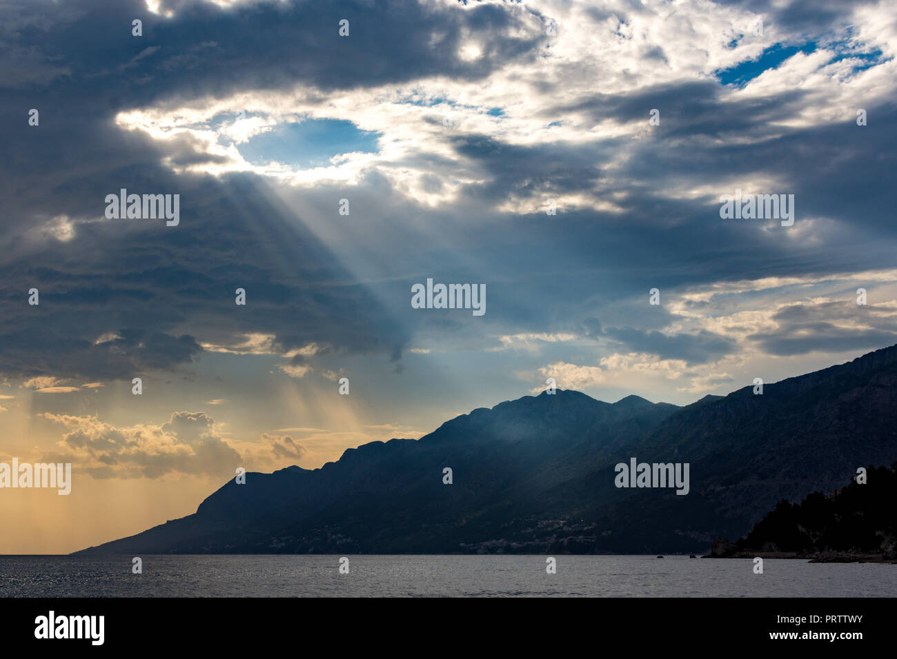 Sunlight on rain clouds hi-res stock photography and images - Alamy
