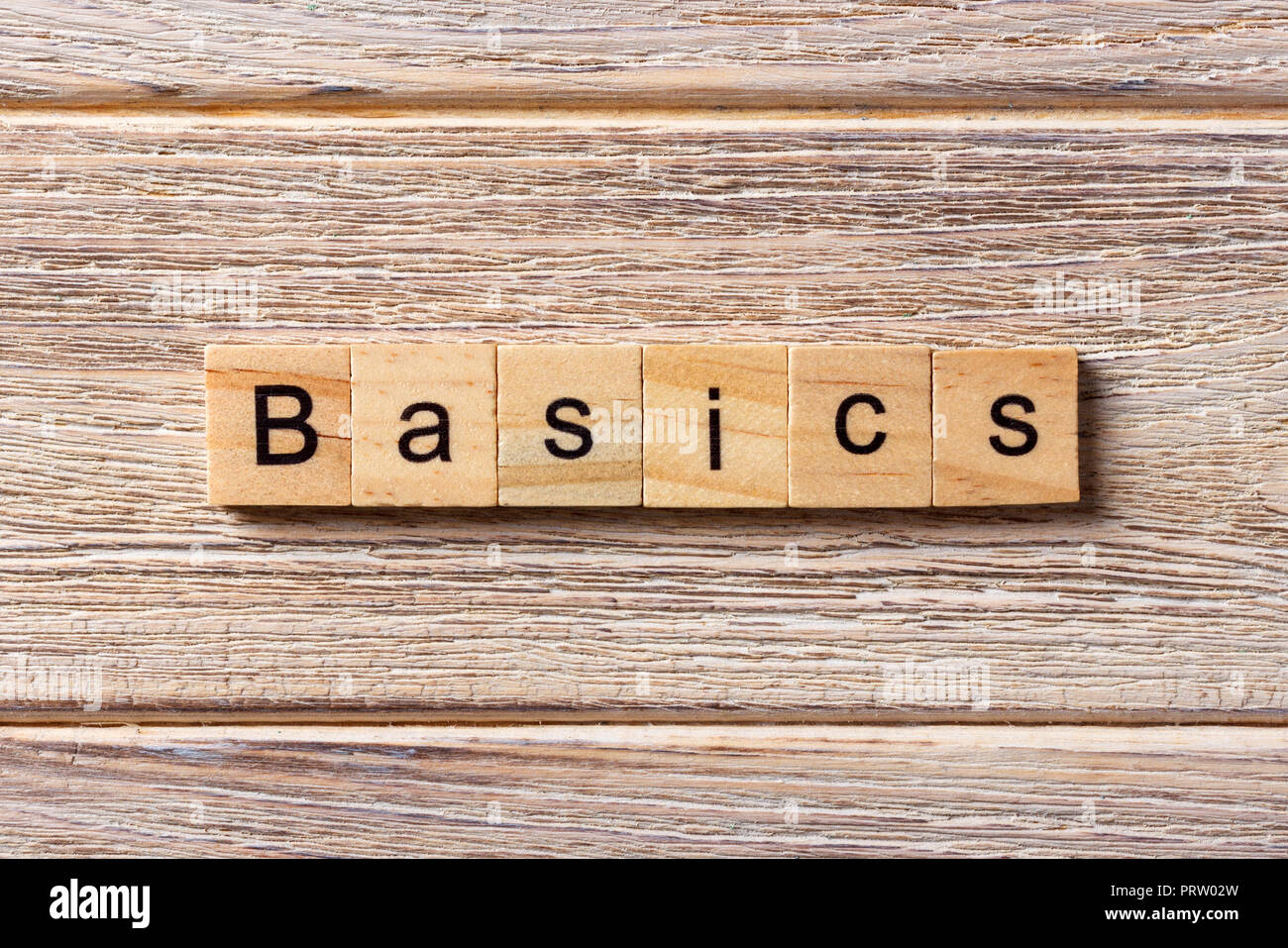 BASICS word written on wood block. BASICS text on table, concept Stock ...
