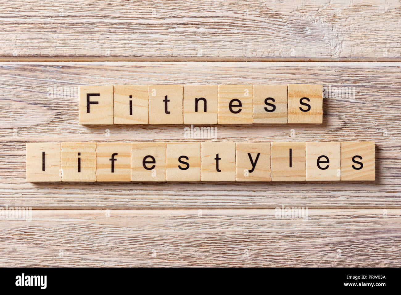 Healthy lifestyle word written on wood block. Healthy lifestyle text on ...