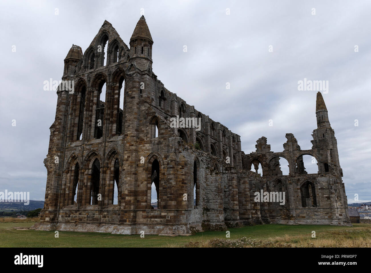 Whitby Abbey is a ruined Benedictine abbey overlooking the North Sea on ...