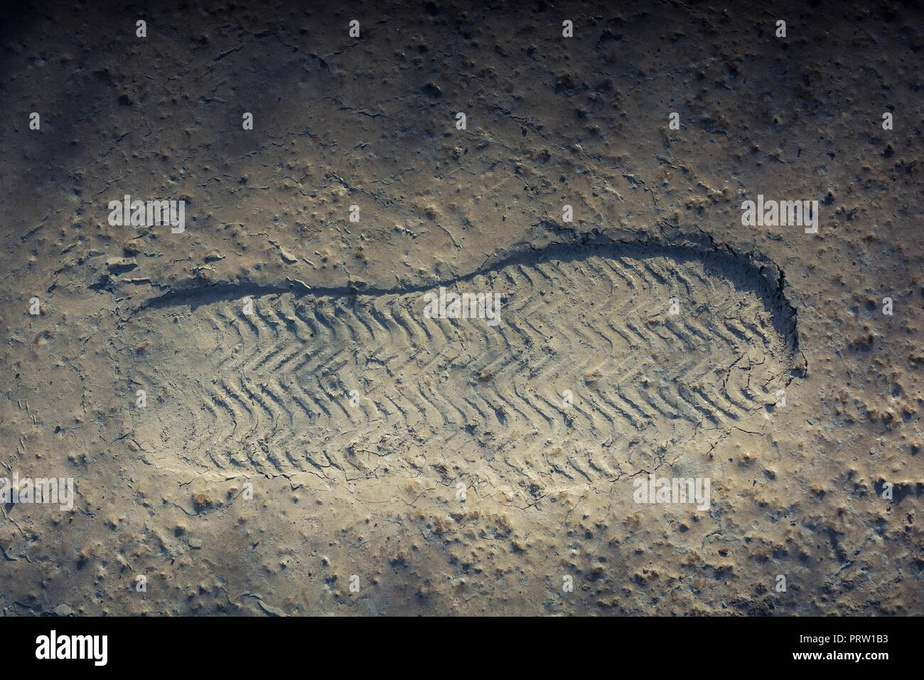 Footstep pattern seen on a concrete background Stock Photo - Alamy