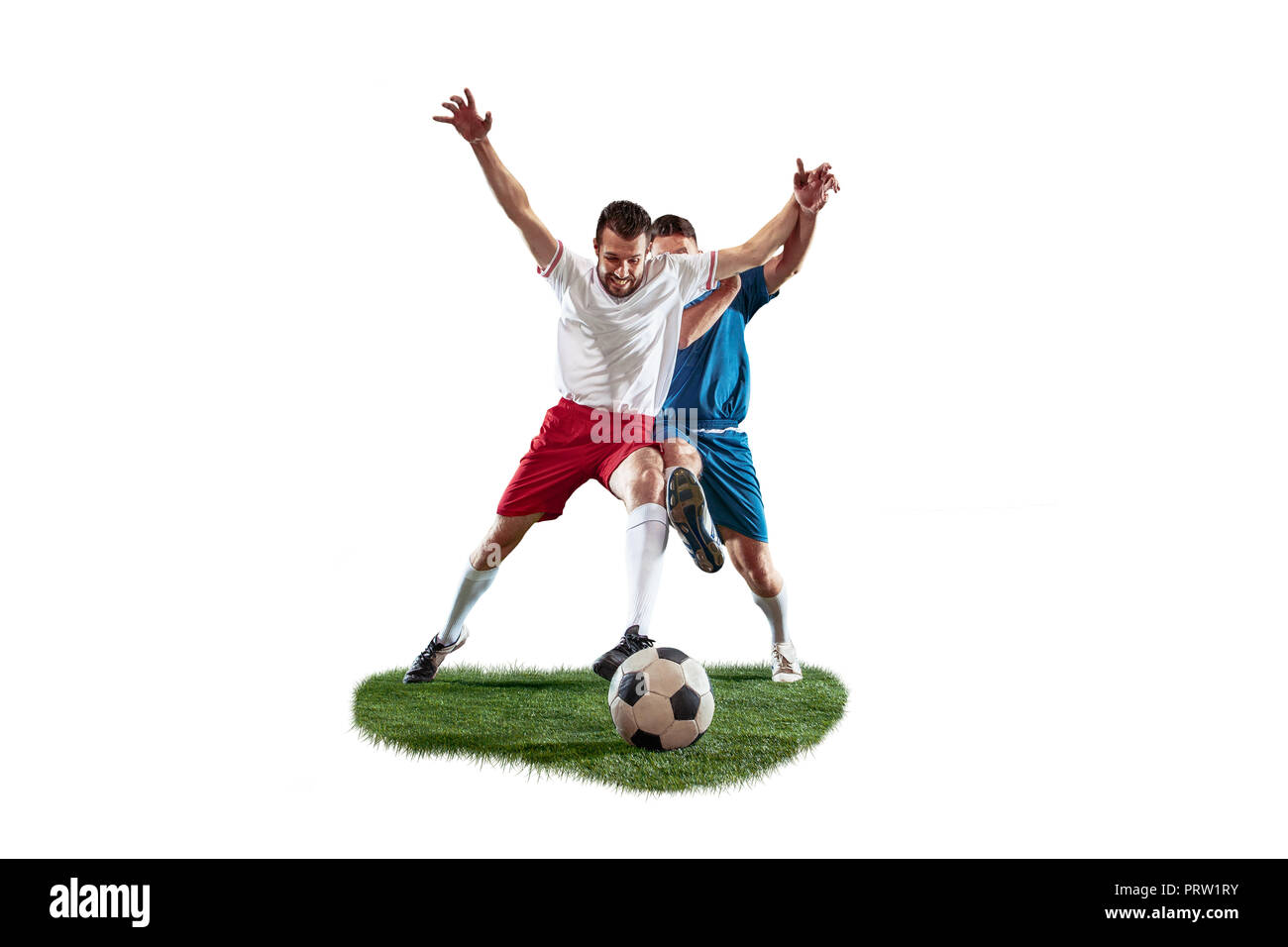 Football players tackling for the ball over white background ...