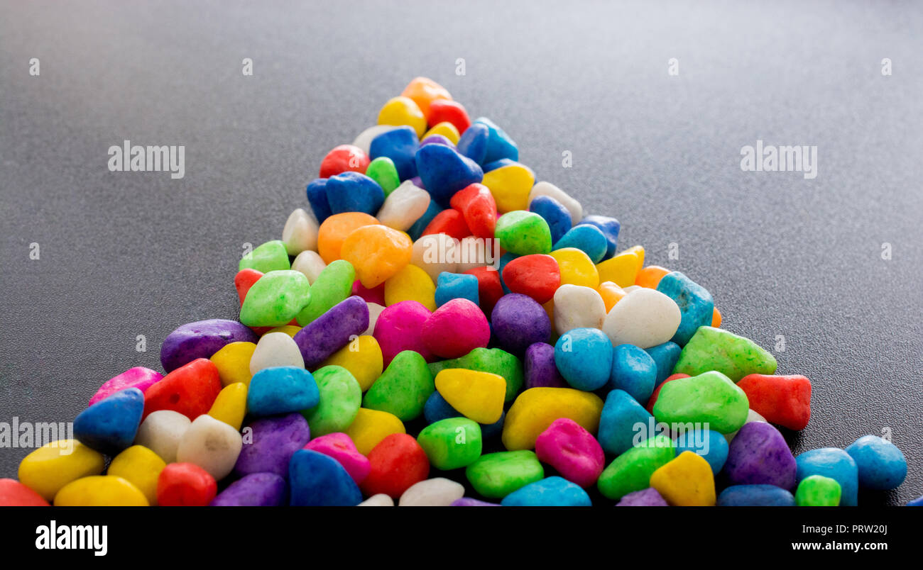 Pile of little colorful pebbles as stone background Stock Photo - Alamy