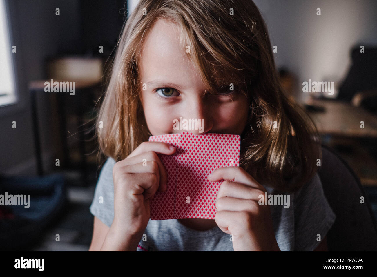 Hiding Cards High Resolution Stock Photography and Images - Alamy